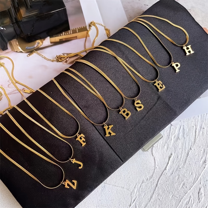 Personality Golden Flat Snake Bone Chain Letter Pendant - Temu Australia