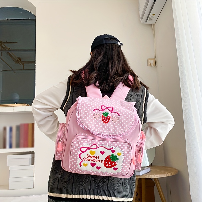 strawberry backpack sold on Temu United States