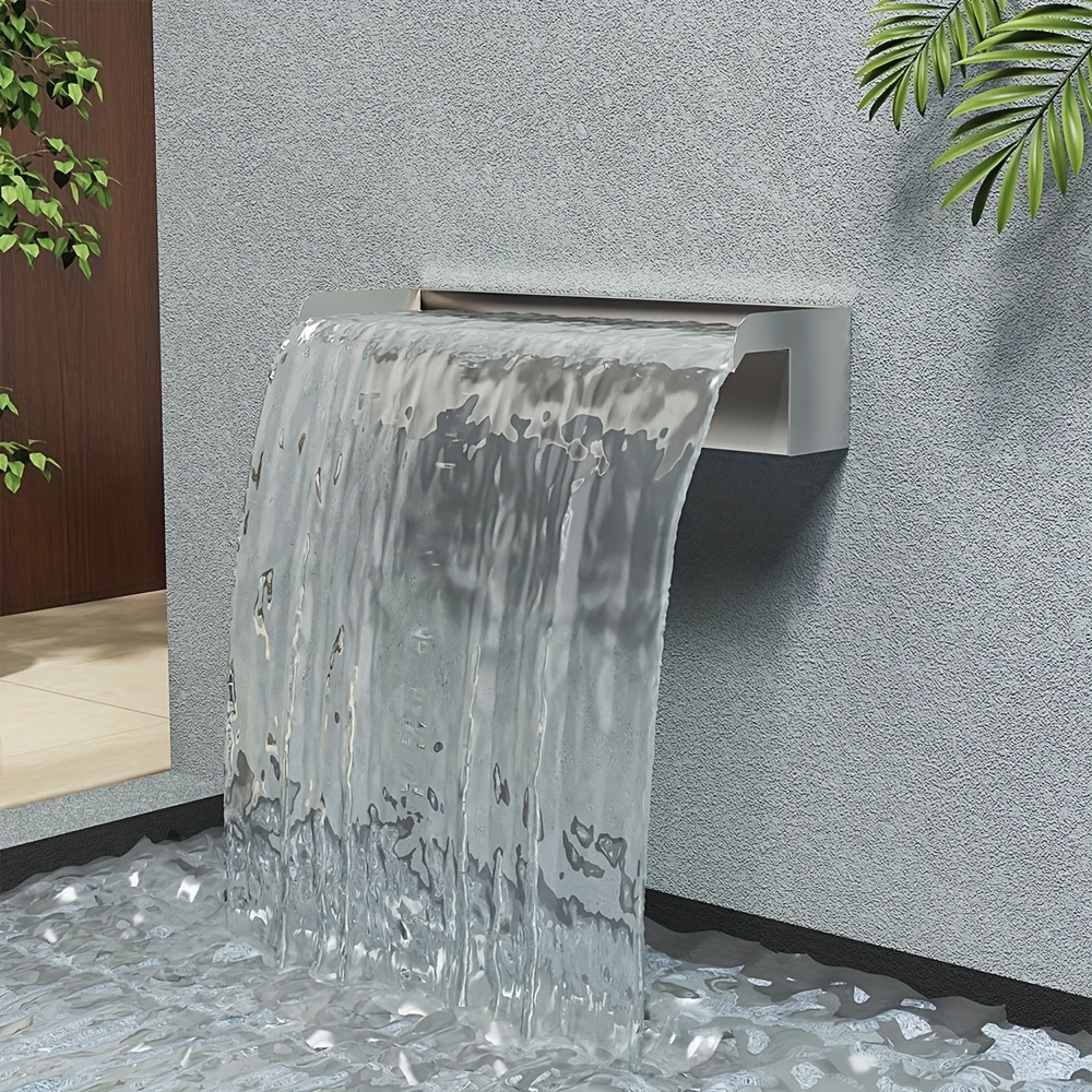 pond waterfall spout - United Kingdom