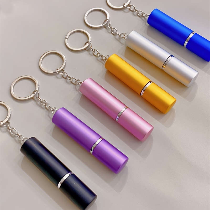 spray bottle keychain sold on Temu United States