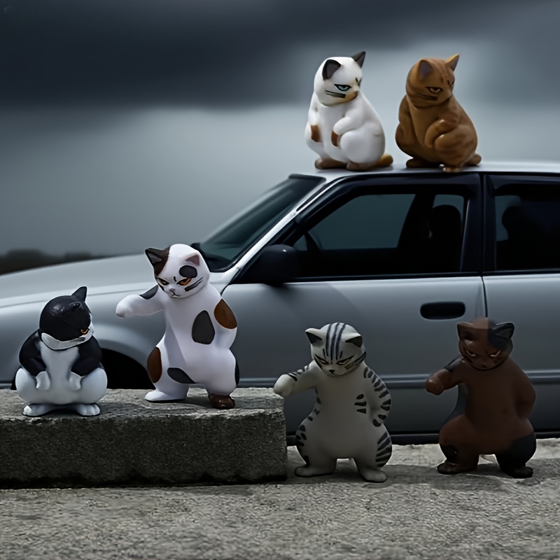 cat figurines sold on Temu Canada