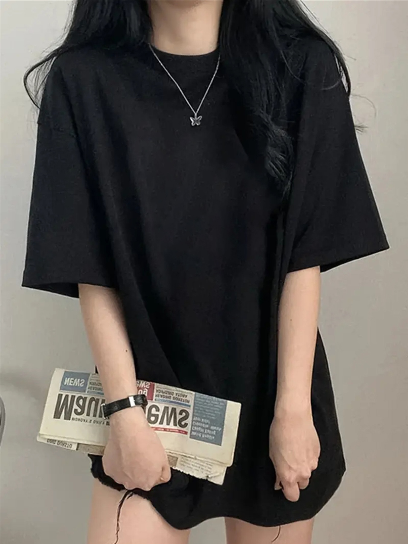 black shirt sold on Temu United States