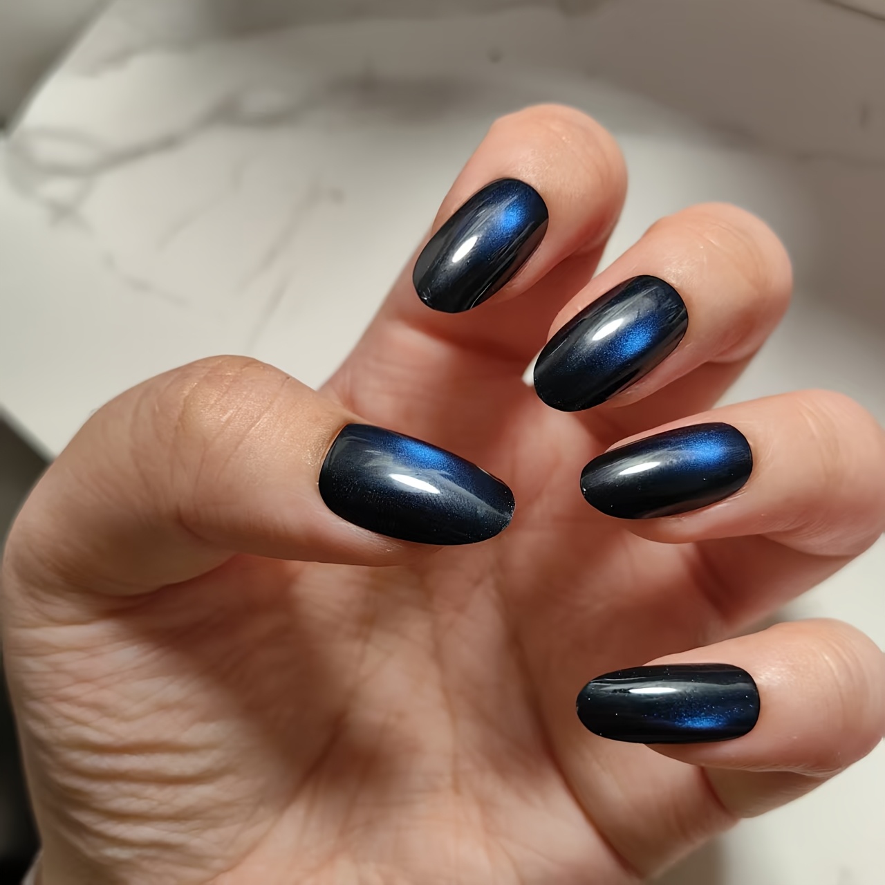 cat eye effect nails sold on Temu Canada
