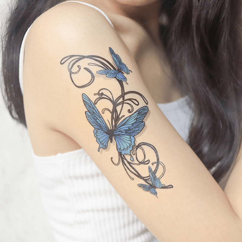 Butterfly Tattoo On Upper Arm