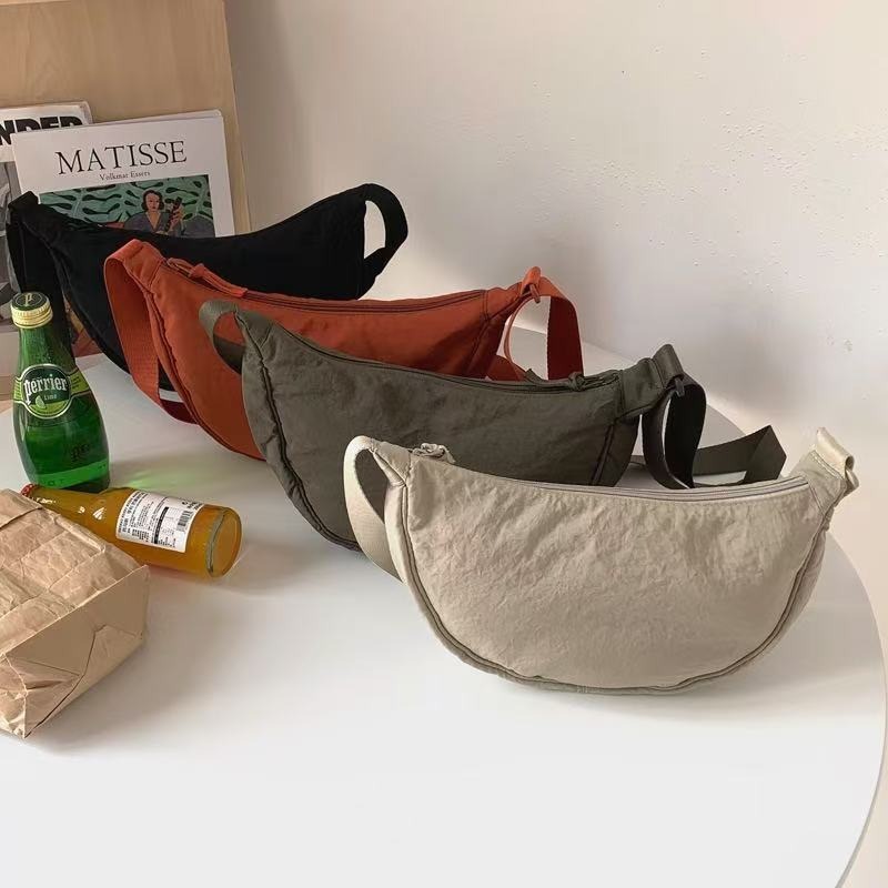 half moon crossbody bag sold on Temu United States