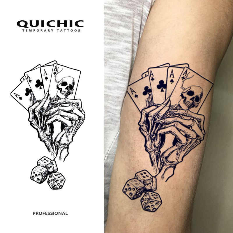 Skeleton hand holding cards tattoo | Orangetattooshop.com